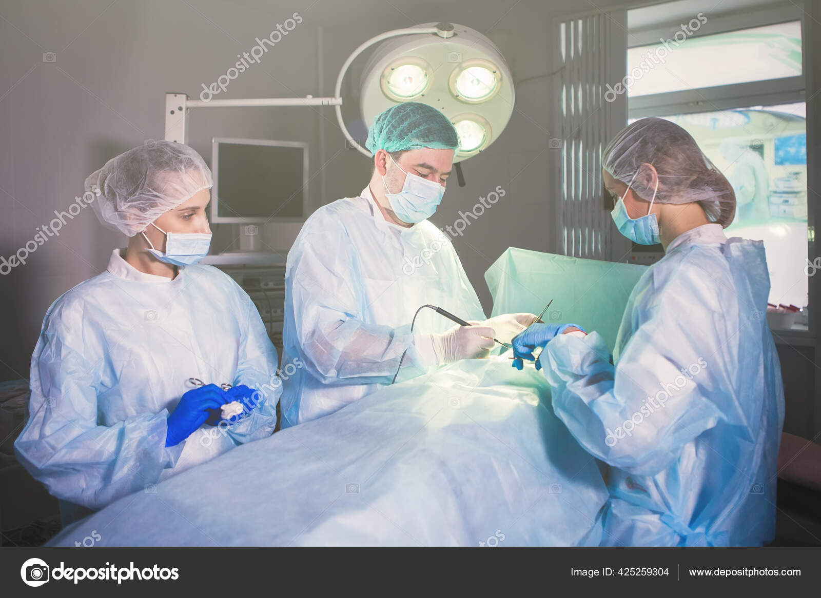 Three Surgeons Abdominal Surgery Blue Uniforms Latex Gloves Medical ...