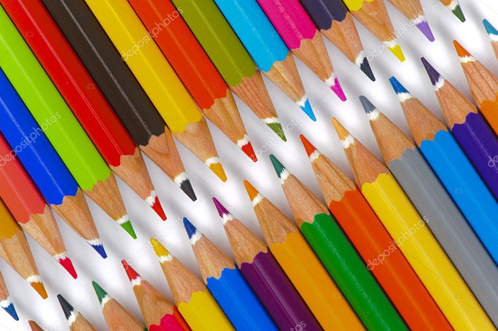Colorful crayons show success with business chart — Stock Photo ...