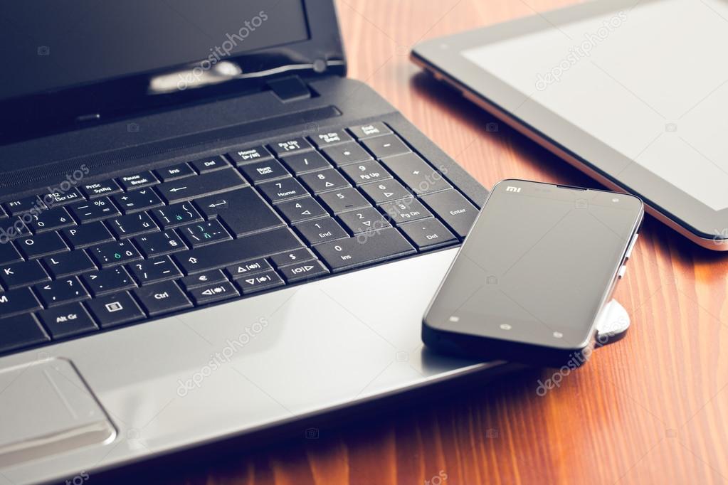 Laptop and smartphone Stock Photo by ©jirkaejc 60440405