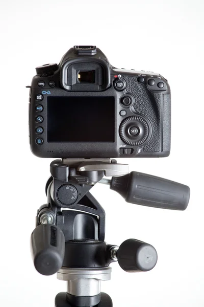 Dslr camera on tripod Stock Photo by ©jirkaejc 65140719