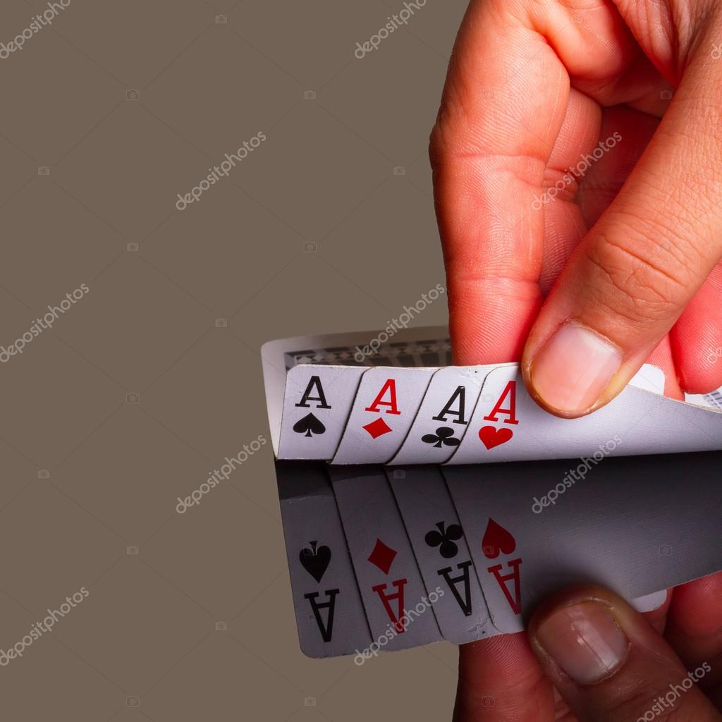Four aces in the hand Stock Photo by ©Patryk_Kosmider 62520107