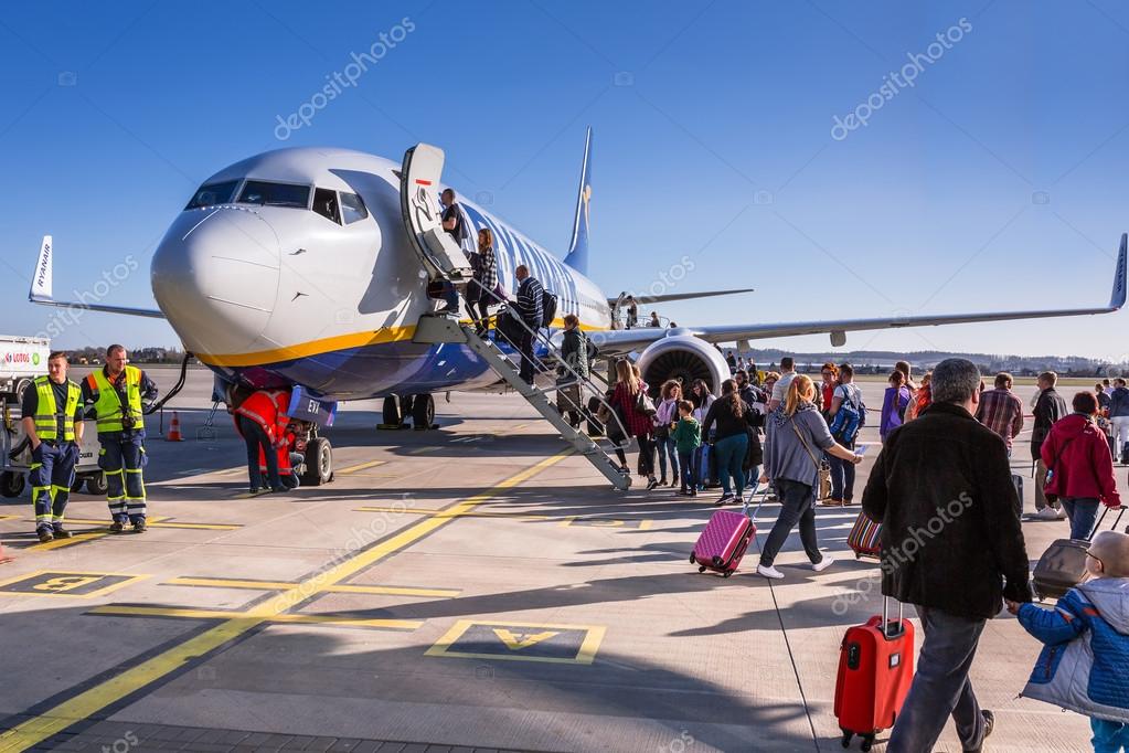 People boarding to Ryanair plane on Lech Walesa Airport in Gdansk ...