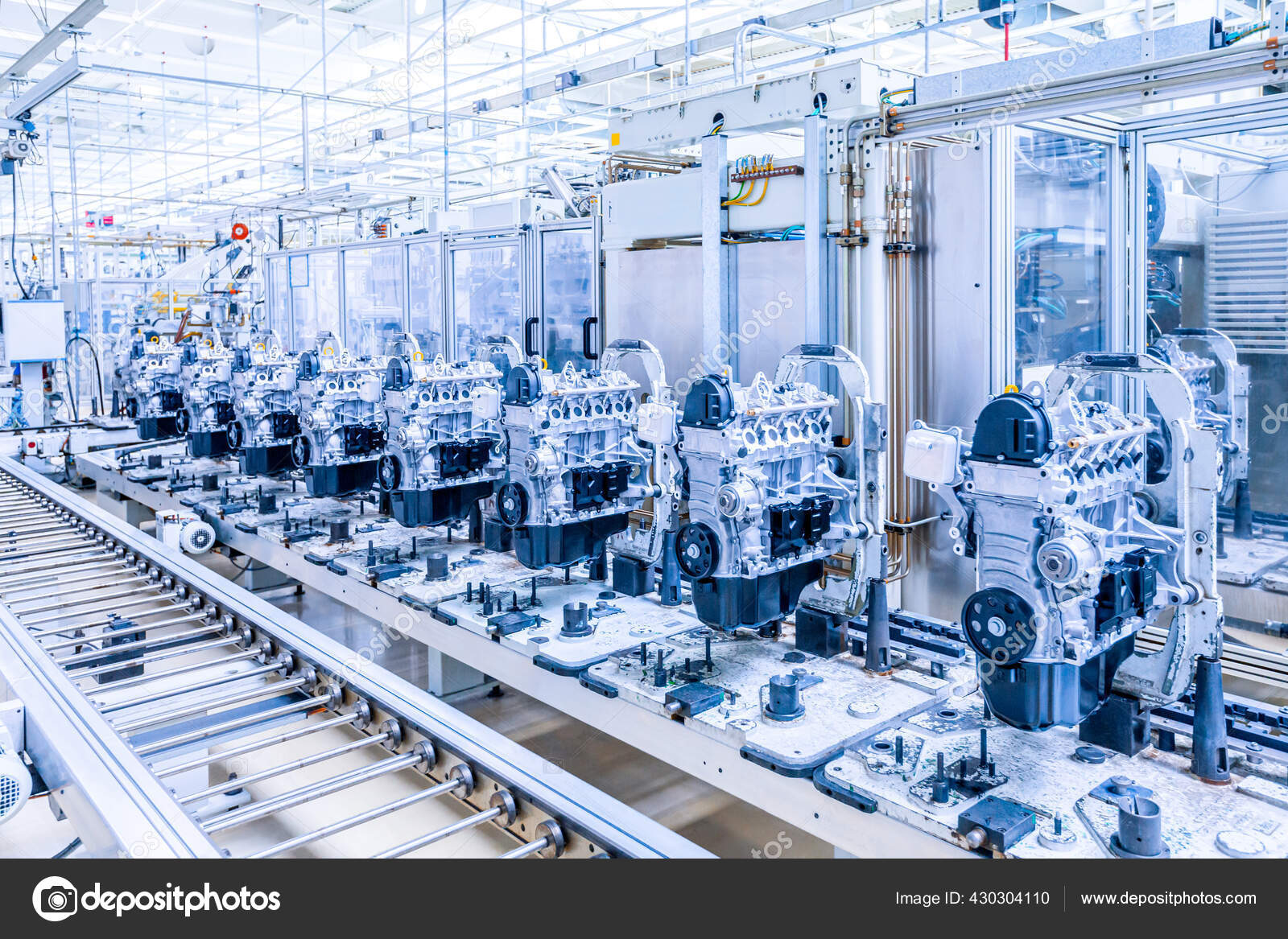 Car engines at conveyor line Stock Photo by ©zhuzhu 430304110