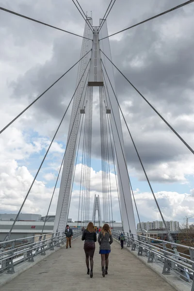 Krasnogorsk, RUSSIA - April 18,2015. Pedestrian bridge is built from ...