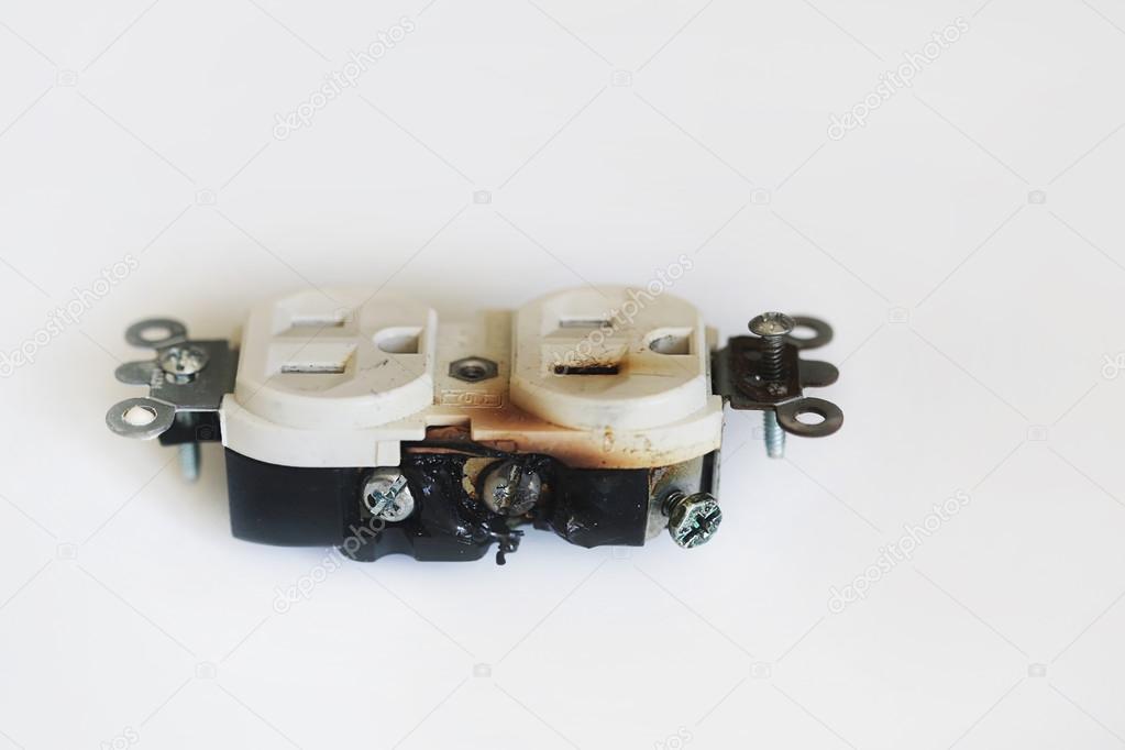 Faulty Burned Electrical Outlet — Stock Photo © kiyyah #88814434