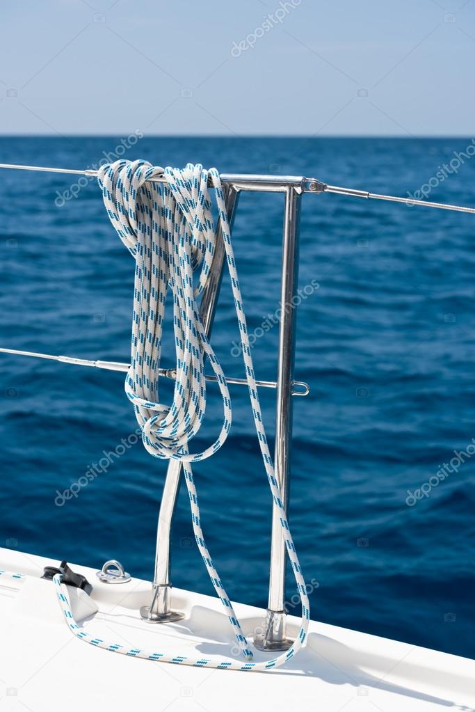 A rope tied around a lifeline on a yacht — Stock Photo © dvoevnore ...
