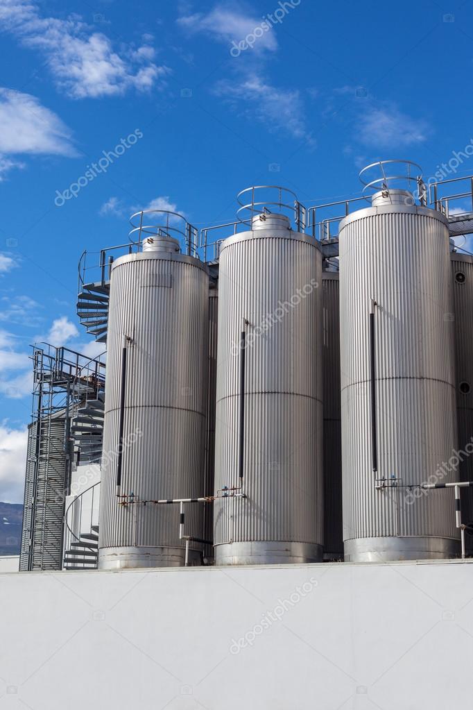 Giant industrial tanks Stock Photo by ©dvoevnore 93036046