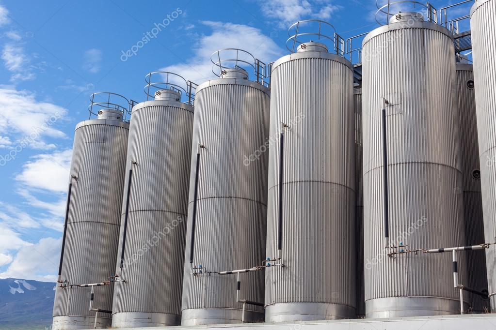 Giant industrial tanks — Stock Photo © dvoevnore #95358096