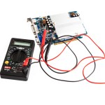 Multimeter and circuit board Stock Photo by ©gorbelabda 1660504