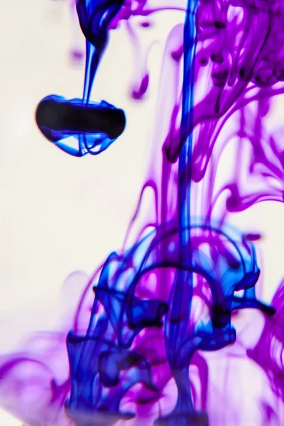 Blue and violet liquid in water Stock Photo by ©Alexandra Lande 61175103