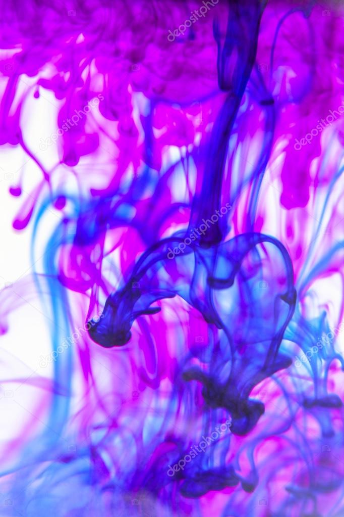 Blue and violet liquid in water — Stock Photo © Alexandra Lande #61175121