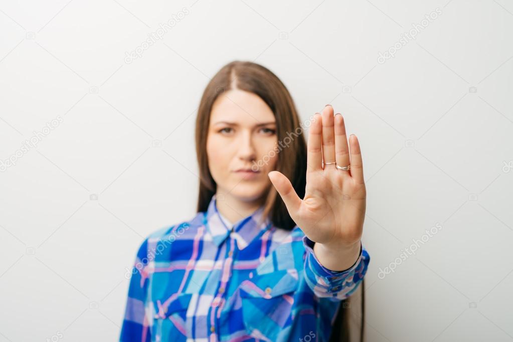 Girl showing stop gesture — Stock Photo © file404 #113968152