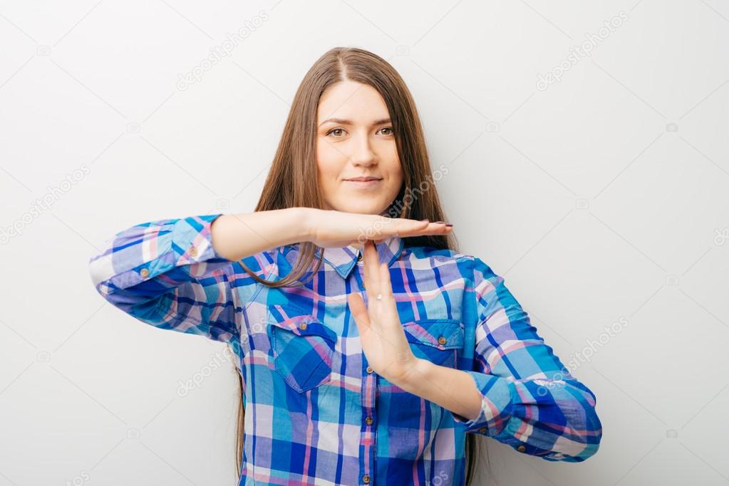 Girl shows timeout gesture — Stock Photo © file404 #113968166