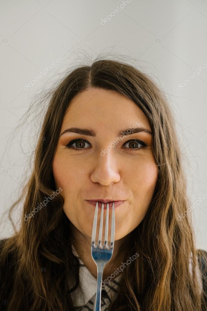 Girl with an empty fork Stock Photo by ©file404 113969408