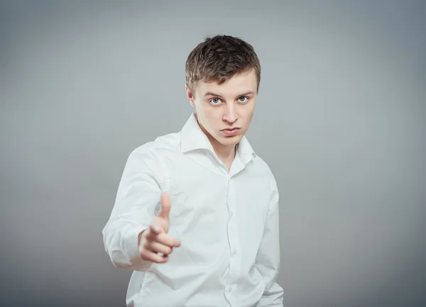 Young man pointing Stock Photo by ©file404 114084282