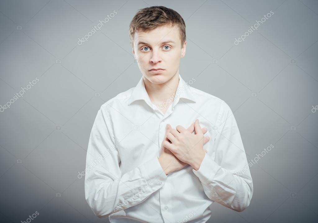 Man with hands on heart Stock Photo by ©file404 114081782