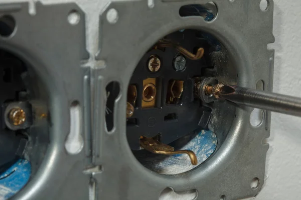 Screwing electrical wall socket Stock Photos, Royalty Free Screwing ...