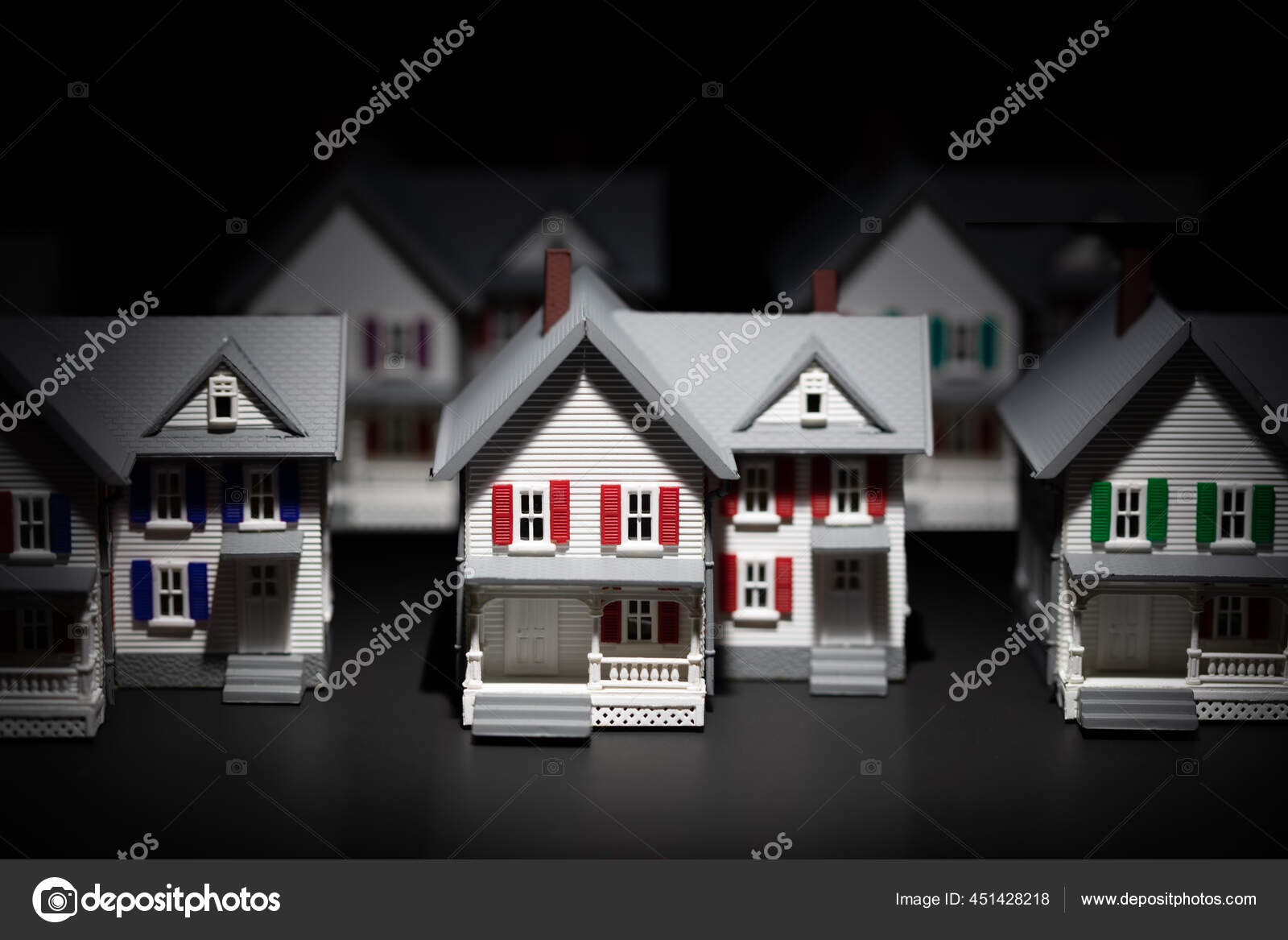 Several Model Houses Row One Spot Lit Front Stock Photo by ©Feverpitch ...