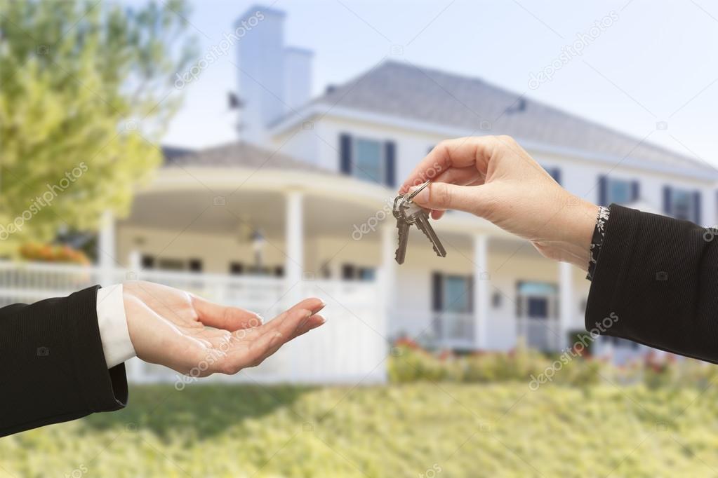 Handing Over The Keys and New House Stock Photo by ©Feverpitch 57623979