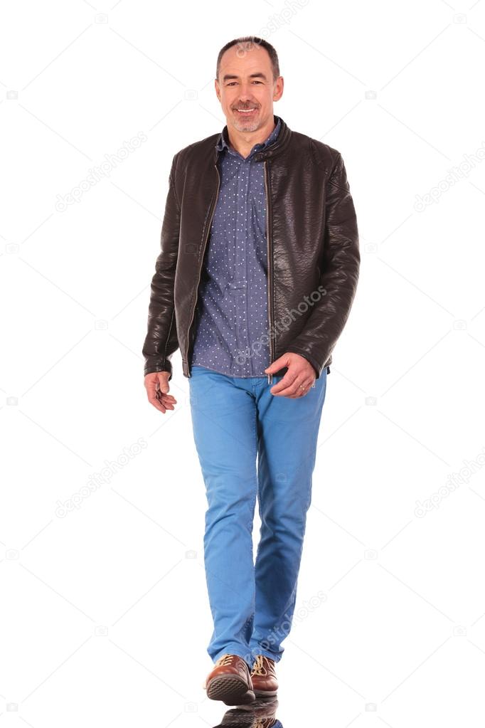 Bald man walking and smiling Stock Photo by ©feedough 100950886