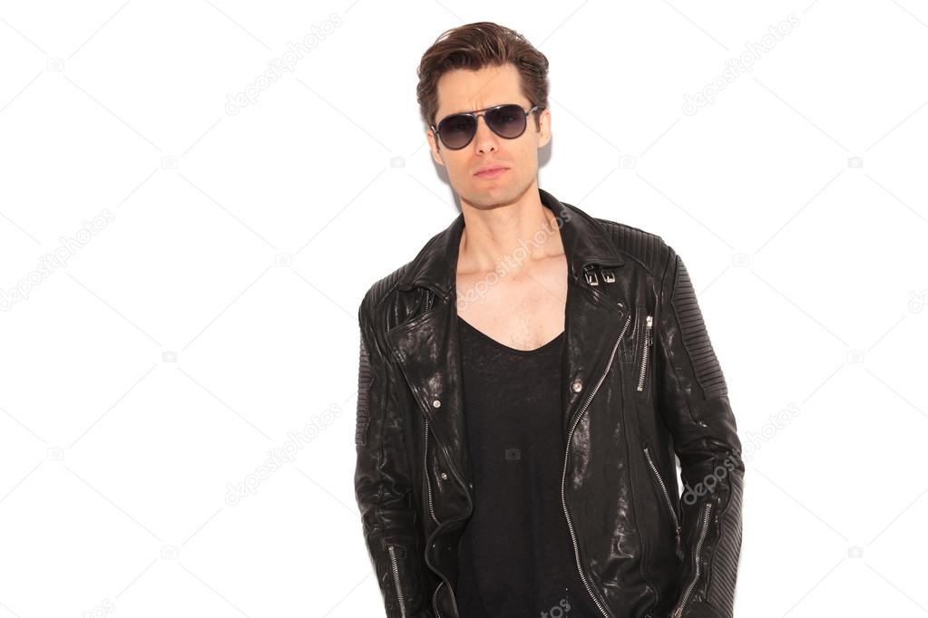 Cool rock and roll man wearing leather jacket and sunglasses Stock ...