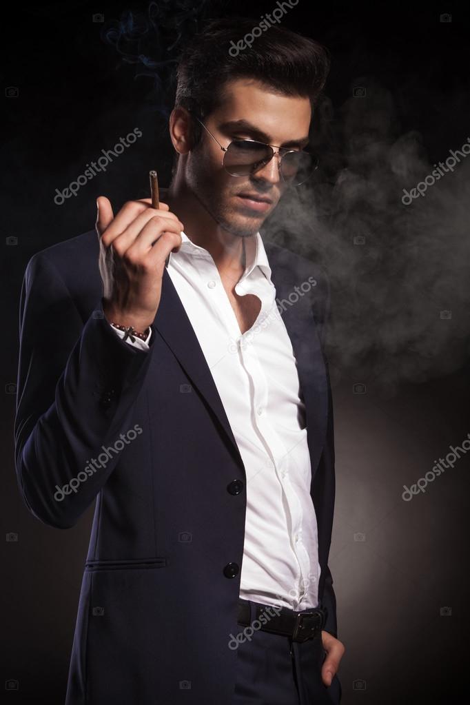 Handsome elegant business man looking down — Stock Photo © feedough ...