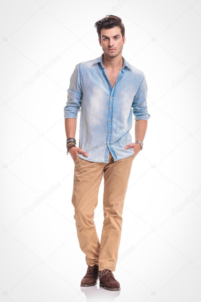 Fashion man standing on studio background — Stock Photo © feedough ...