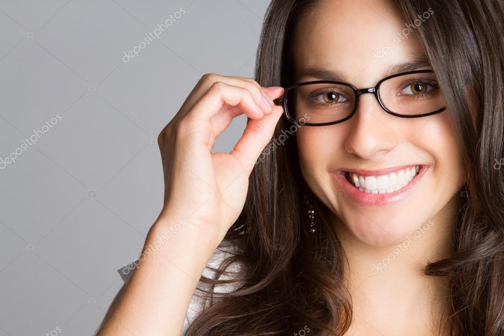 Young Woman Wearing Glasses — Stock Photo © keeweeboy #85545480 Young Woman Wearing Glasses — Stock Photo © keeweeboy #85545480