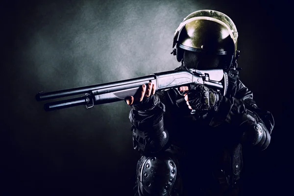 Spec ops soldier with shotgun - Stock Image - Everypixel