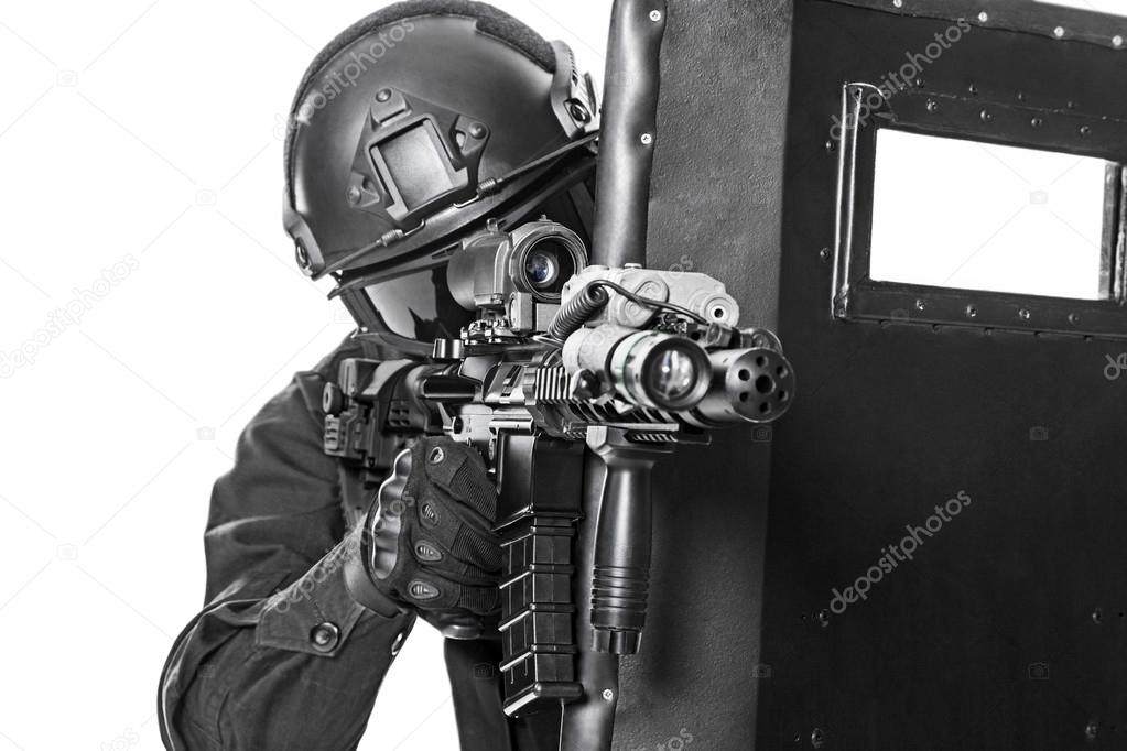 SWAT officer with ballistic shield — Stock Photo © zabelin #86373590
