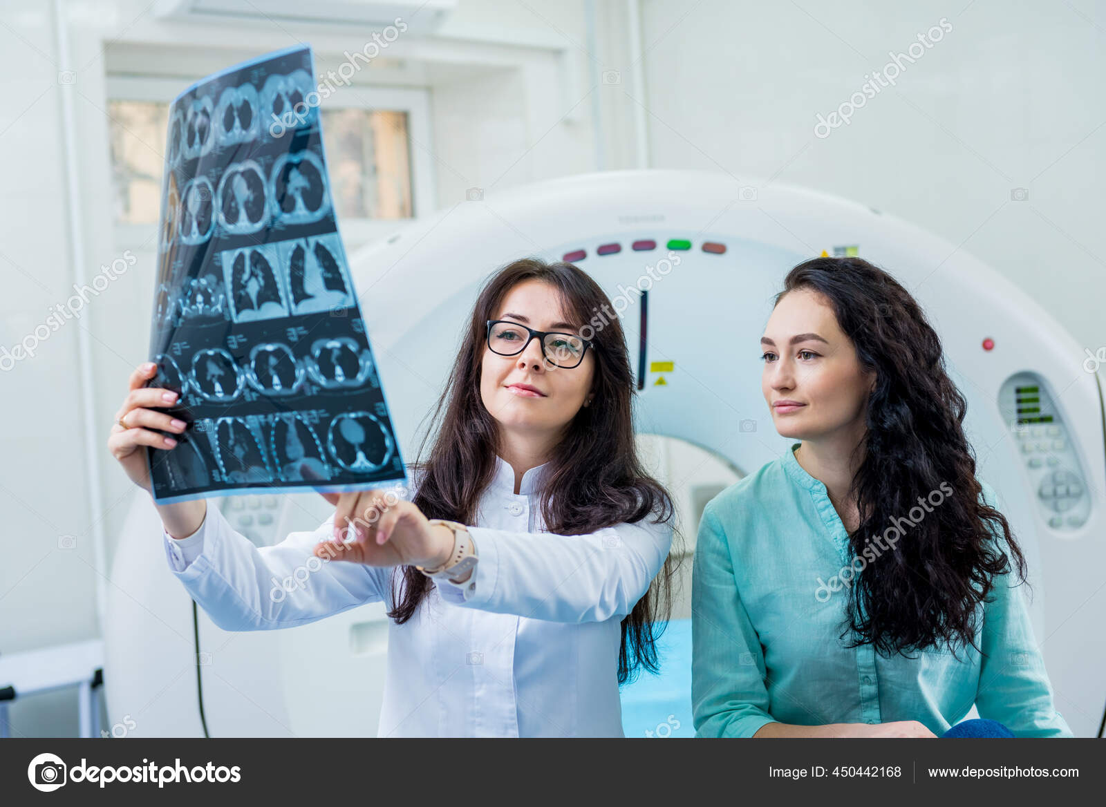 Radiologist with a female patient examining a CT scan — Stock Photo ...