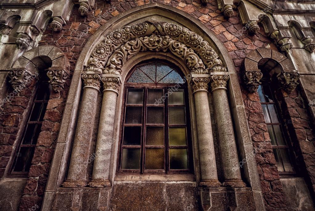 Gothic house with columns Stock Photo by ©Romaset 97340244