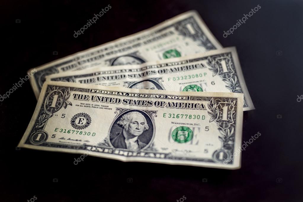 Three dollar bills Stock Photo by ©Romaset 97390046