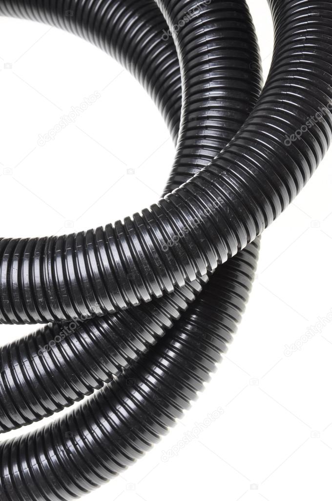 Black plastic corrugated pipe Stock Photo by ©Zetor2010 55536051