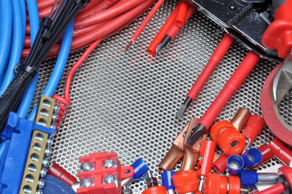 Electrical tools, component and cables on metal surface — Stock Photo ...