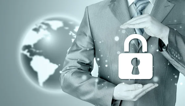 Businessman holding security lock - Stock Image - Everypixel
