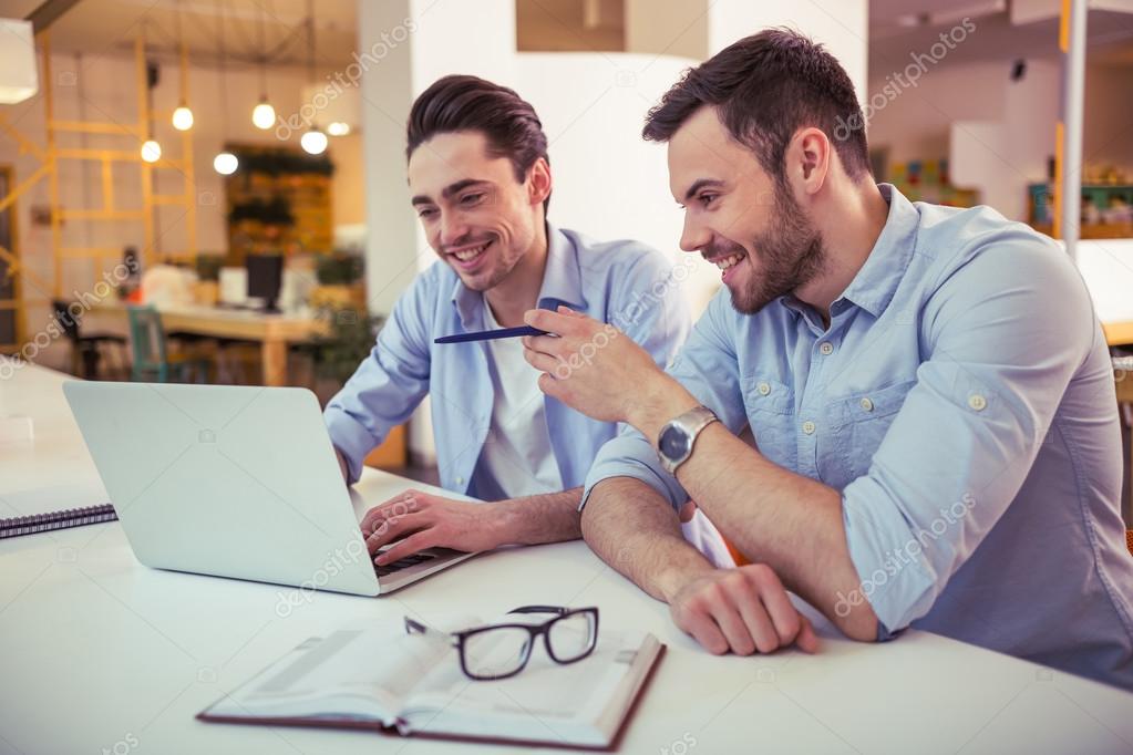Handsome men working ⬇ Stock Photo, Image by © GeorgeRudy #102577084