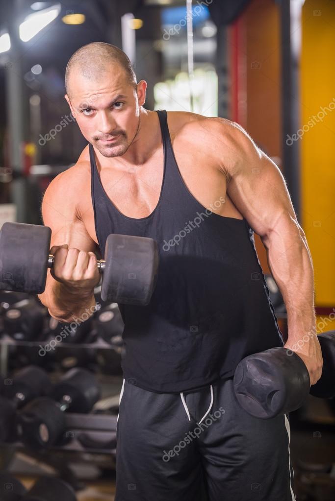 Bodybuilder at gym — Stock Photo © GeorgeRudy #79627452