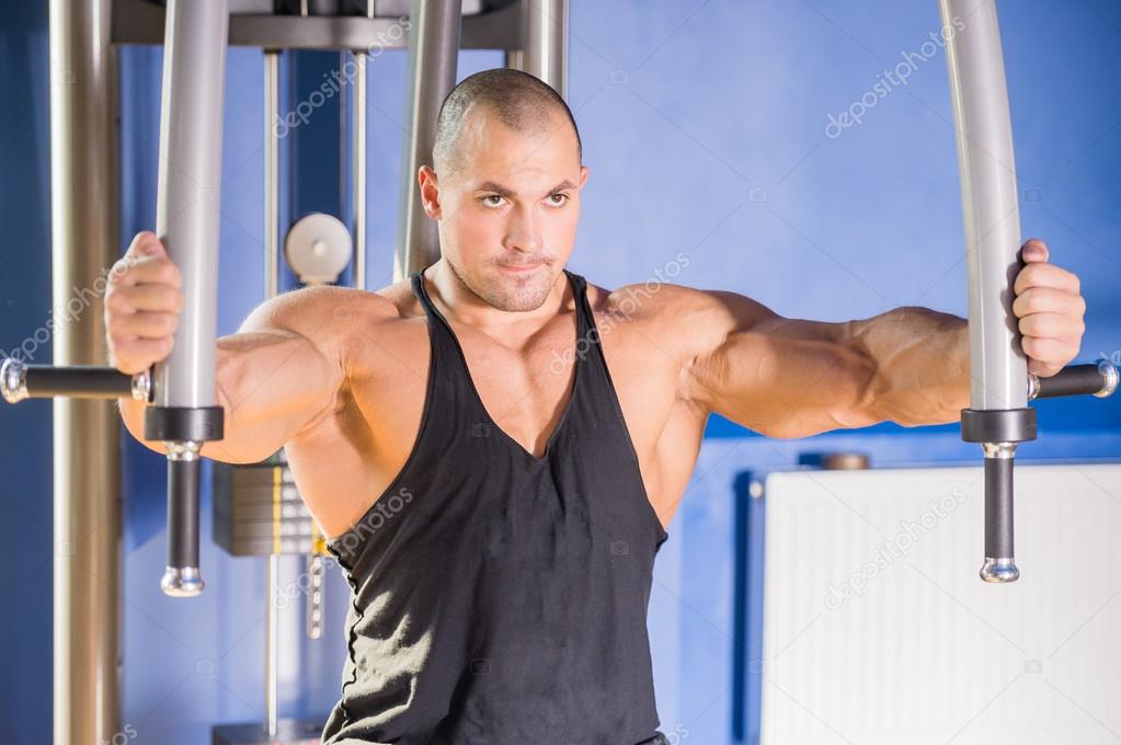Bodybuilder at gym Stock Photo by ©GeorgeRudy 79627560