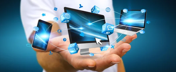 Businessman connecting tech device in his hand - Stock Image - Everypixel