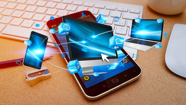 Tech devices connected to each other by mobile phone - Stock Image ...