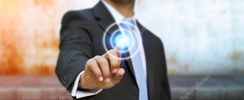Businessman touching modern tactile screen button — Stock Photo ...