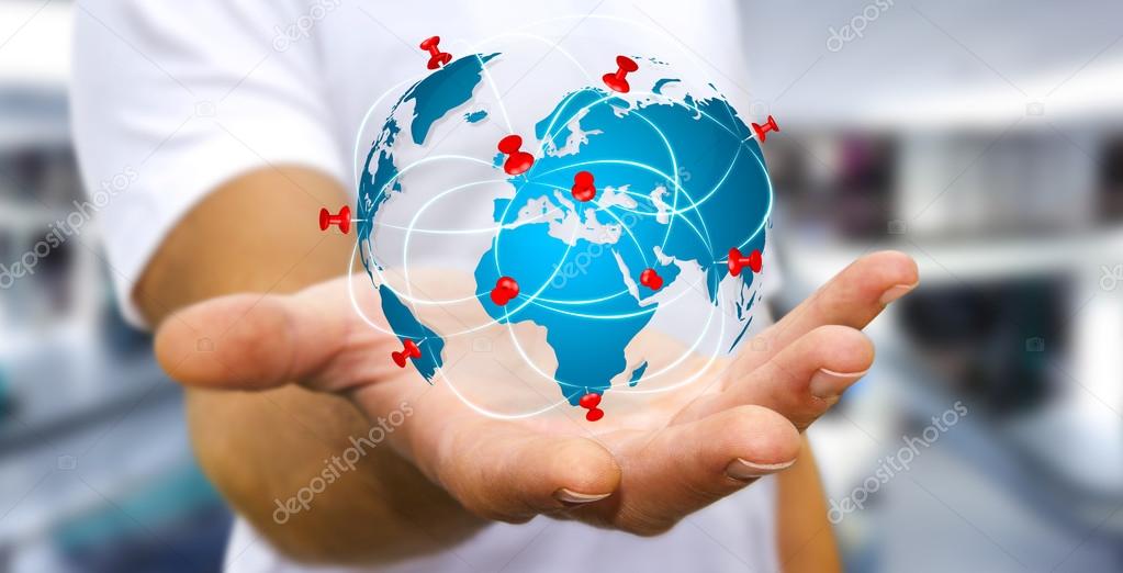 Empresario sosteniendo mapa digital del mundo en sus manos 2023
