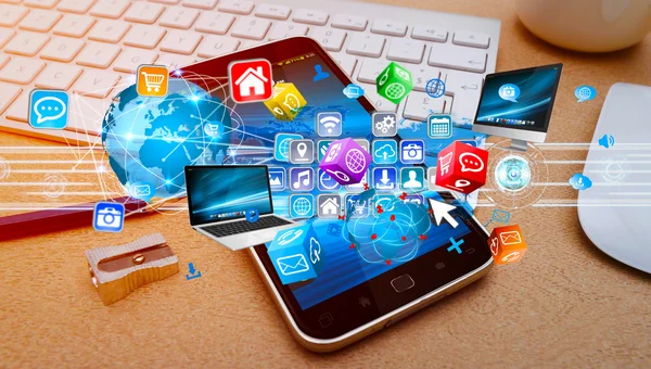 Tech devices connected to each other by mobile phone - Stock Image ...