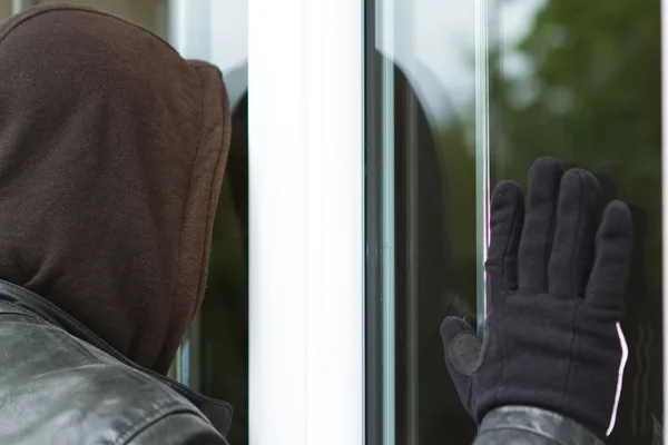 Robber entering the house Stock Photo by ©photographee.eu 54646893