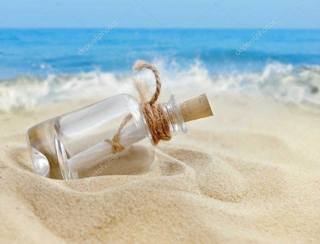 A letter in a bottle on the beach Stock Photo by ©NataliiaMelnyc 77440050