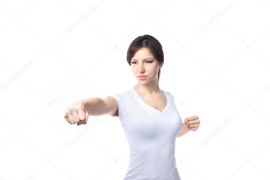Young woman practicing self defense Stock Photo by ©dimabl 105343640
