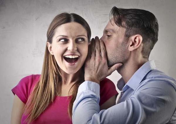 Man telling a secret to a woman Stock Photo by ©olly18 33265117
