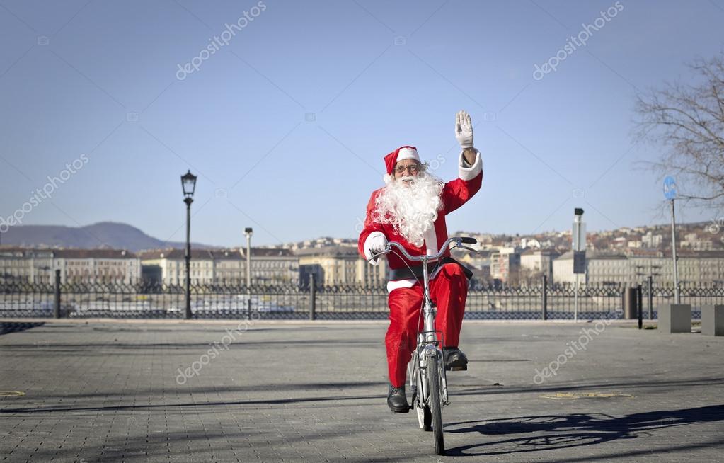 Santa riding a bike Stock Photo by ©olly18 94915984