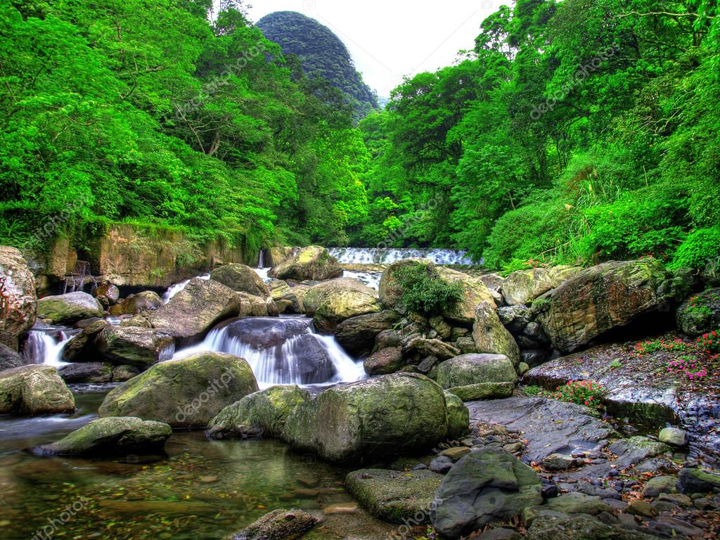 Waterfall and rocks — Stock Photo © marchcattle #66835537